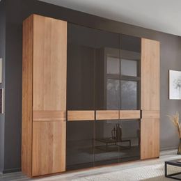 Pharao24.de Dreht&uuml;renschrank Schlafzimmerkleiderschrank in modernem Design teilmassiv