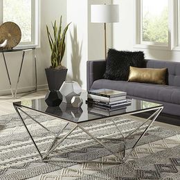 Pharao24.de Luxus Couchtisch mit Rauchglas Platte Edelstahl Gestell