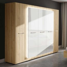 Pharao24.de Dreht&uuml;renkleiderschrank in Wei&szlig; Hochglanz und Wildeiche Optik 220 cm hoch