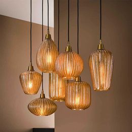 Pharao24.de Vintage Pendelleuchte aus Glas 7-flammig 95 cm breit