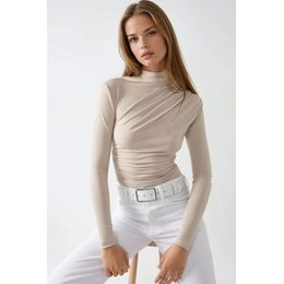 Bluse mit hohem Kragen und Drapierungsdetails