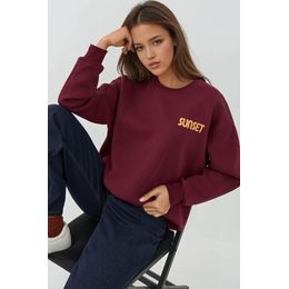 Bestickter Rundhals-Pullover mit erhobenem Design