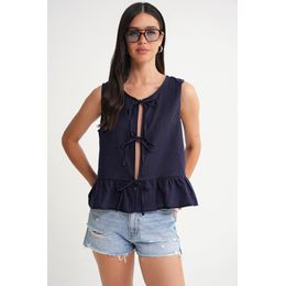 R&uuml;schenbluse mit Schleifenfront