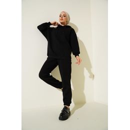 &Uuml;bergro&szlig;es Kapuzen-Sweatshirt und aktive Hose Set