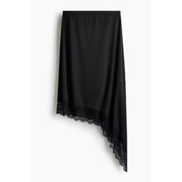 Asymmetrischer Rock mit Spitze