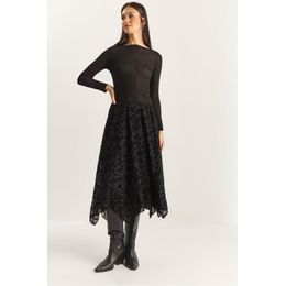 Hochtaillierter asymmetrischer Midi-Rock