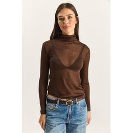 Taillierte Langarm-Turtleneck-Bluse
