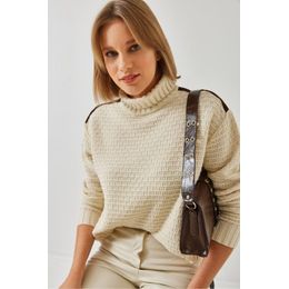 Strukturierter Rollkragenstrickpullover