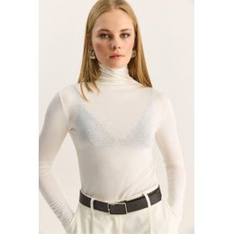 Figurbetonte Langarm-Turtleneck-Bluse