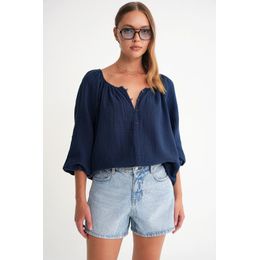 Knopfbluse aus Musselin