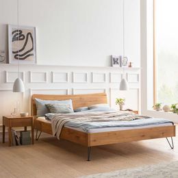 Pharao24.de Wildeiche Natur Bett in modernem Design Vierfu&szlig;gestell aus Metall