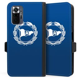 DeinDesign Xiaomi Redmi Note 10 Pro Handy Klapph&uuml;lle Handyh&uuml;lle aus Kunst Leder schwarz Flip Case Arminia Bielefeld Soccer Official Licensed Product Sideflip mit