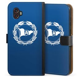 DeinDesign Galaxy XCover 6 Pro Handy Klapph&uuml;lle Handyh&uuml;lle aus Kunst Leder schwarz Flip Case Arminia Bielefeld Soccer Official Licensed Product Sideflip mit 