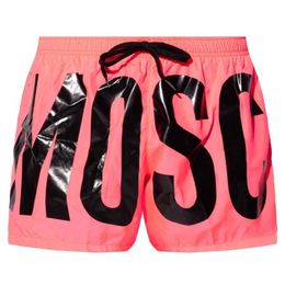 Kurze Badeshorts mit Logo-Aufdruck der Marke Moschino in Hellrosa