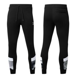 Puma Cloud Pack MCS Track -Anzug Bottoms Joggers Hosen Schwarze Herren 596336 01