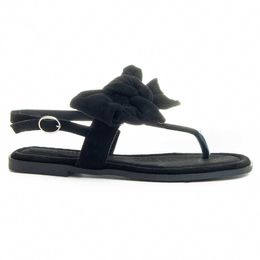 Montevida Flache Sandale Flipp4 in Schwarz