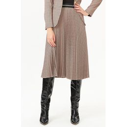 Faltenrock und kontrastierende elastische Taille