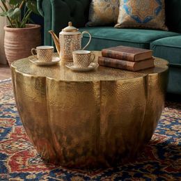 Pharao24.de Designer Tisch Couchtisch in Goldfarben mit Hammerschlag Optik