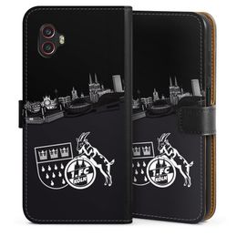 DeinDesign Galaxy XCover 6 Pro Handy Klapph&uuml;lle Handyh&uuml;lle aus Kunst Leder schwarz Flip Case 1. Fc K&ouml;ln Official Licensed Product Skyline Sideflip mit langer 