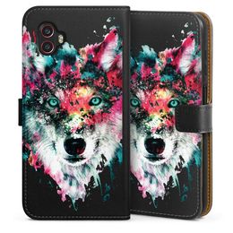 DeinDesign Galaxy XCover 6 Pro Handy Klapph&uuml;lle Handyh&uuml;lle aus Kunst Leder schwarz Flip Case Riza Peker Colourful Wolf Sideflip mit langer Lasche