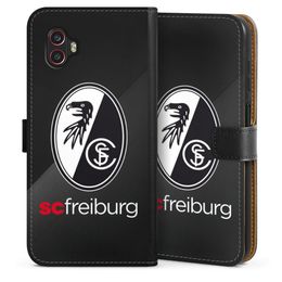 DeinDesign Galaxy XCover 6 Pro Handy Klapph&uuml;lle Handyh&uuml;lle aus Kunst Leder schwarz Flip Case Sc Freiburg Lettering Logo Sideflip mit langer Lasche