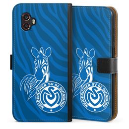 DeinDesign Galaxy XCover 6 Pro Handy Klapph&uuml;lle Handyh&uuml;lle aus Kunst Leder schwarz Flip Case Msv Duisburg Merchandise Zebra Sideflip mit langer Lasche