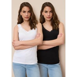 Spitzentop Tamaris, Damen, Gr. 34, schwarz, wei&szlig;, Single Jersey, Obermaterial: 95% Baumwolle, 5% Elasthan. Obermaterial wei&szlig;: 95% Baumwolle, 5% Elasthan, unifarben, Basic, figurbetont h&uuml;ftlang, Tops Spitzentop, mit femininen V-Ausschnitt, figurbetont
