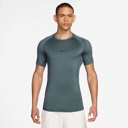 Trainingsshirt Nike "M NP DF TIGHT TOP SS", Herren, Gr. L, mineral slate, schwarz, Obermaterial: 90% Polyester, 10% Elasthan, normal, Shirts, eng anliegender Schnitt, atmungsaktiv, schnell trocknend, elastisch