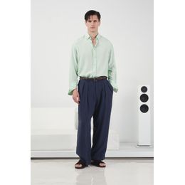 Hochgeschnittene weite Faltenhose