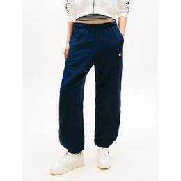 Sweathose Tommy Jeans "TJW BADGE SWEATPANT", Damen, Gr. XL (42), N-Gr, schwarz night navy, Web, Obermaterial: 100% Baumwolle, relaxed fit lang, Hosen Sweathose, Relaxed Fit mit Elastikbund am Bein