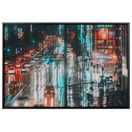Leinwandbild Regen in der leuchtenden Stadt