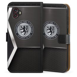 DeinDesign Galaxy XCover 6 Pro Handy Klapph&uuml;lle Handyh&uuml;lle aus Kunst Leder schwarz Flip Case Official Licensed Product Metallic Look Eintracht Braunschweig 