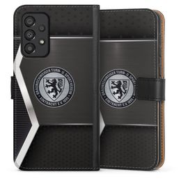 DeinDesign Galaxy A33 5G Handy Klapph&uuml;lle Handyh&uuml;lle aus Kunst Leder schwarz Flip Case Metallic Look Eintracht Braunschweig Official Licensed Product Sideflip 