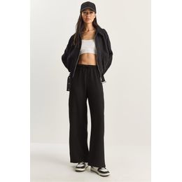 Hoch taillierte weit geschnittene Hose