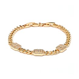 Luxenter Armband mit funkelnden Zirkonia-Steinen, 18 Karat Gelbgold-Finish &ndash; Syos