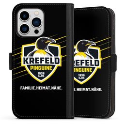 DeinDesign iPhone 13 Pro Handy Klapph&uuml;lle Handyh&uuml;lle aus Kunst Leder schwarz Flip Case Sports Krefeld Pinguine Ice Hockey Sideflip mit Lasche