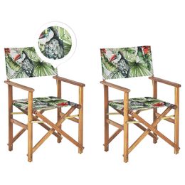 Beliani GARTENSTUHL 2er-Set Akazienholz dunkelbraun Auflagen cremewei&szlig;/bunt Tukanmotiv Cine