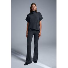Hochtaillierte Schlagstrickhose