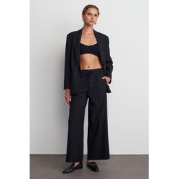 Weite Crepe-Hosen mit Kordelzugbund