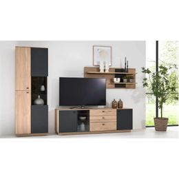 Wohn-Concept Interliving 2025 Wohnkombination 4526HS83 in Wildeiche Massiv mit Absatz in Echt Kork, Glas: Anthrazit Satin matt ca.325x209x50 cm