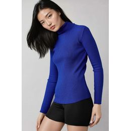 Taillierter Strukturrollkragenpullover