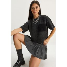 Oversized Rundhals-Strickpullover mit Tasche