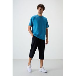Herren Capri Shorts mit weitem Bein in Mittelh&ouml;he