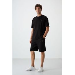 &Uuml;bergr&ouml;&szlig;iges Kurzarm-T-Shirt und Shorts-Set
