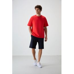 Oversized T-Shirt- und Shorts-Set