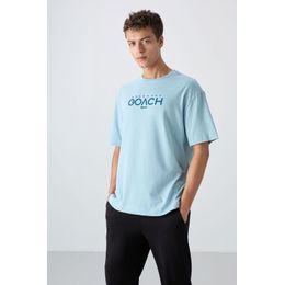 Oversized Logo-Patch Rundhals-T-Shirt