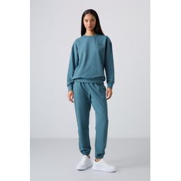 &Uuml;bergro&szlig;es Sweatshirt- und elastisches Bund-Hosen-Set
