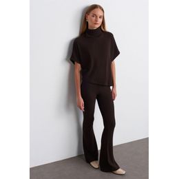Hochtaillierte Schlagstrickhose