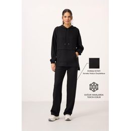 Oversized Kapuzenpullover und weit geschnittene Hosen Set