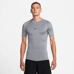Nike Herren Trainingsshirt "M NP DF TIGHT TOP SS"smoke grau, b, Gr. L, Obermaterial: 90% Polyester, 10% Elasthan, Shirts